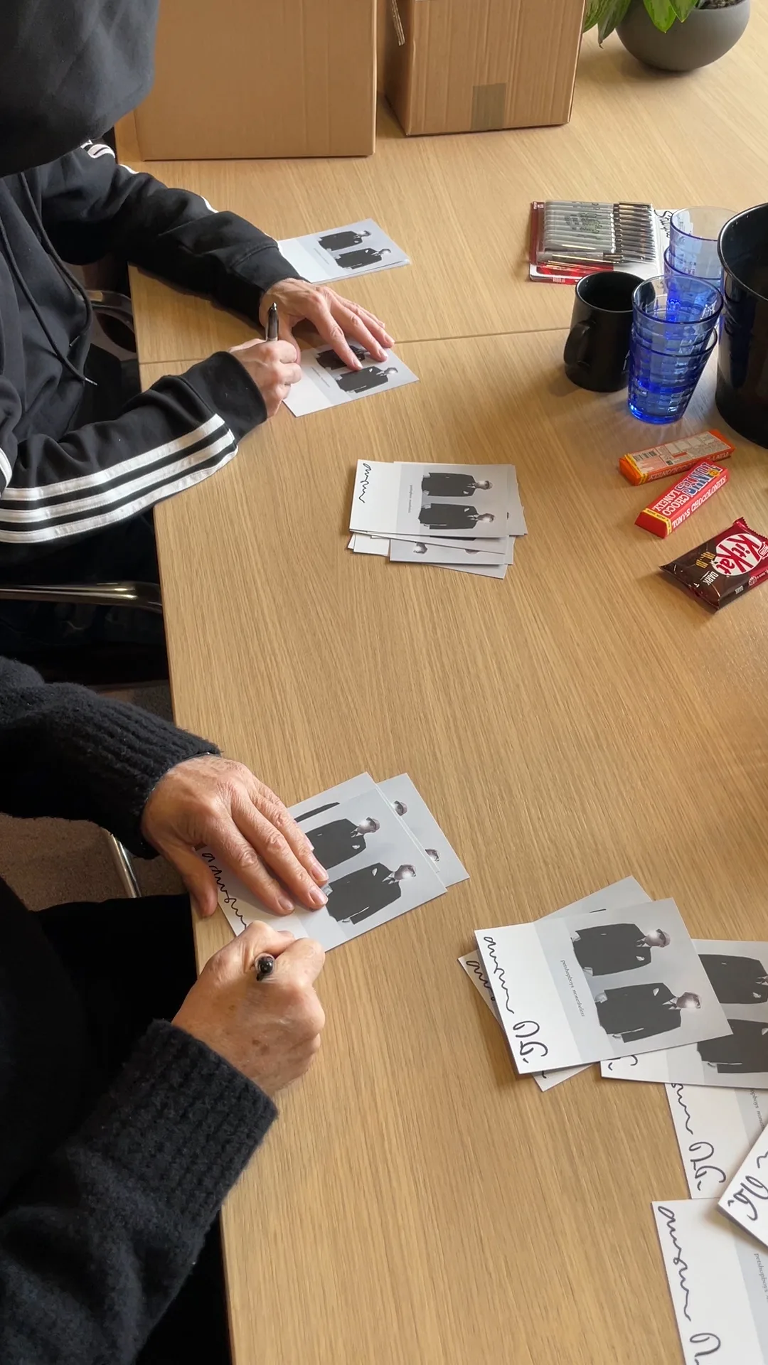 Signing art cards — Pet Shop Boys